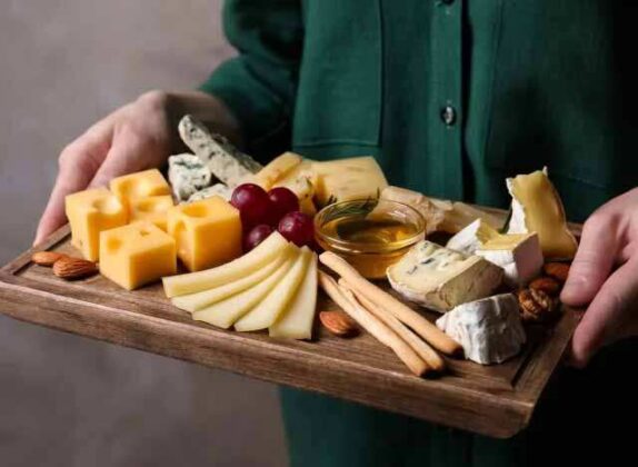12 Side Effects of Eating Too Much Cheese, According to Dietitians | Dr ...