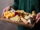 12 Side Effects of Eating Too Much Cheese, According to Dietitians | Dr ...